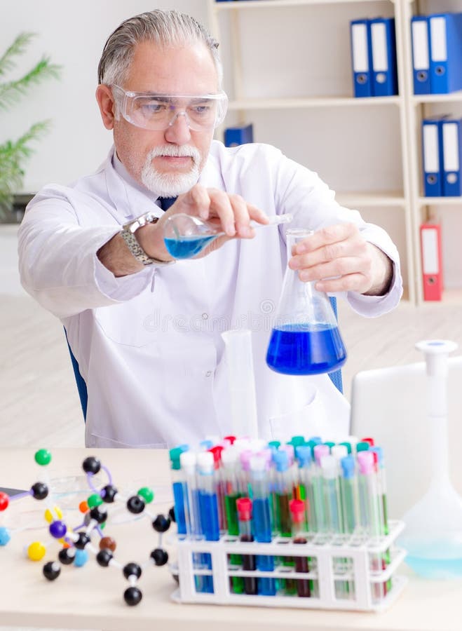 Old Male Chemist Working in the Lab Stock Photo - Image of fluid ...