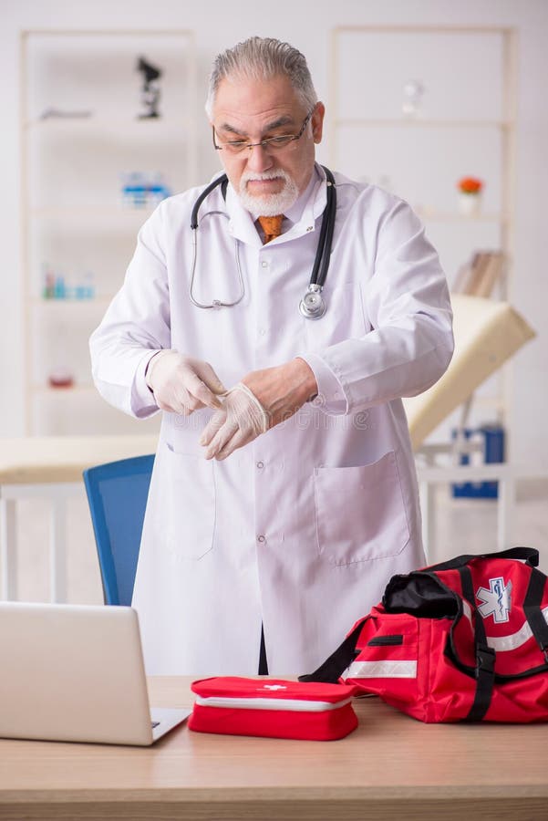 Old Male Doctor in First Aid Concept Stock Photo - Image of rescue ...