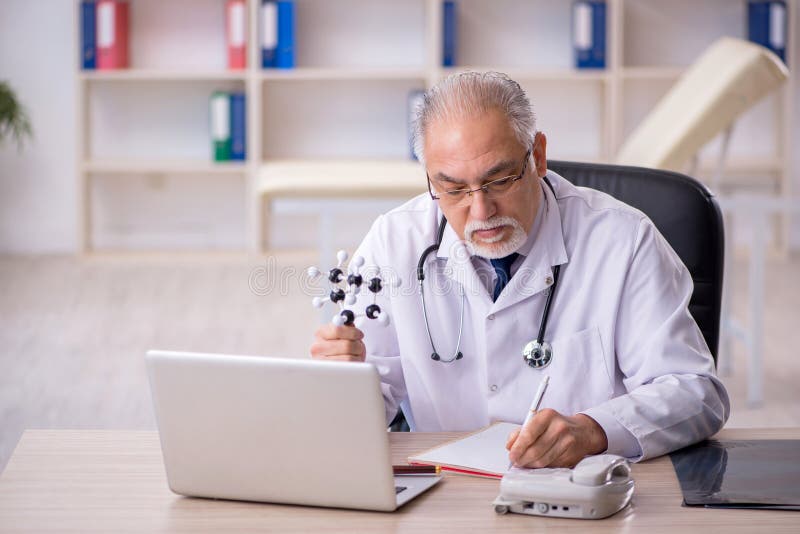 Old Male Doctor Lecturer Holding Molecular Model Stock Image - Image of ...