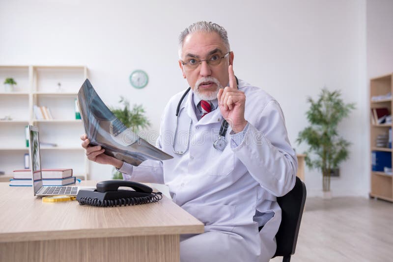 Old Male Doctor Radiologist Working in the Clinic Stock Image - Image ...