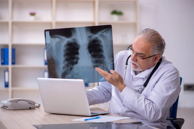 Old Male Doctor Radiologist Working in the Clinic Stock Photo - Image ...
