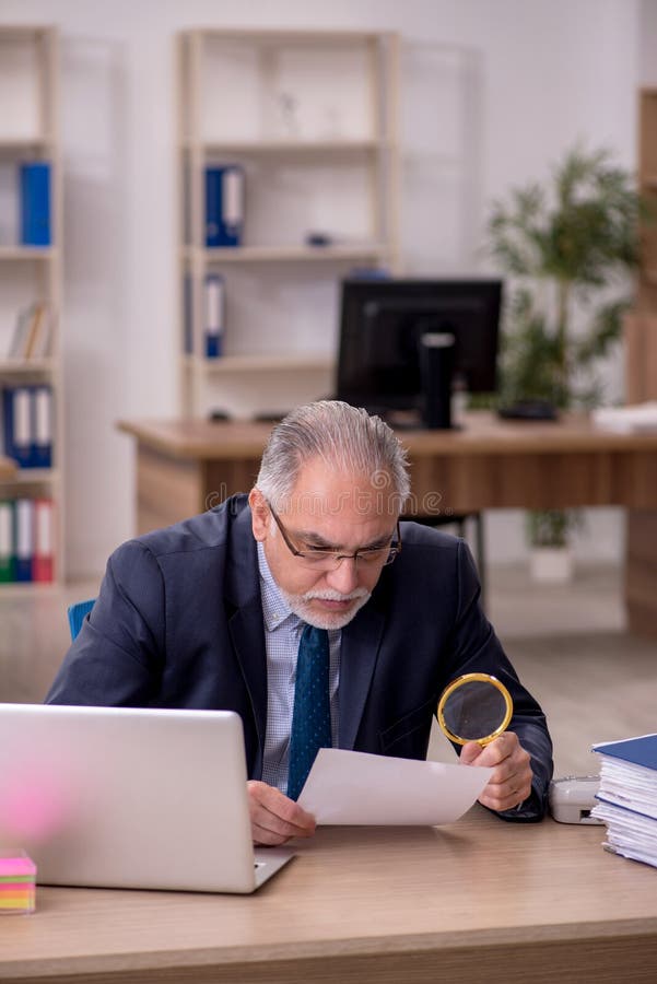 Old Male Employee Auditor Holding Loupe at Workplace Stock Image ...