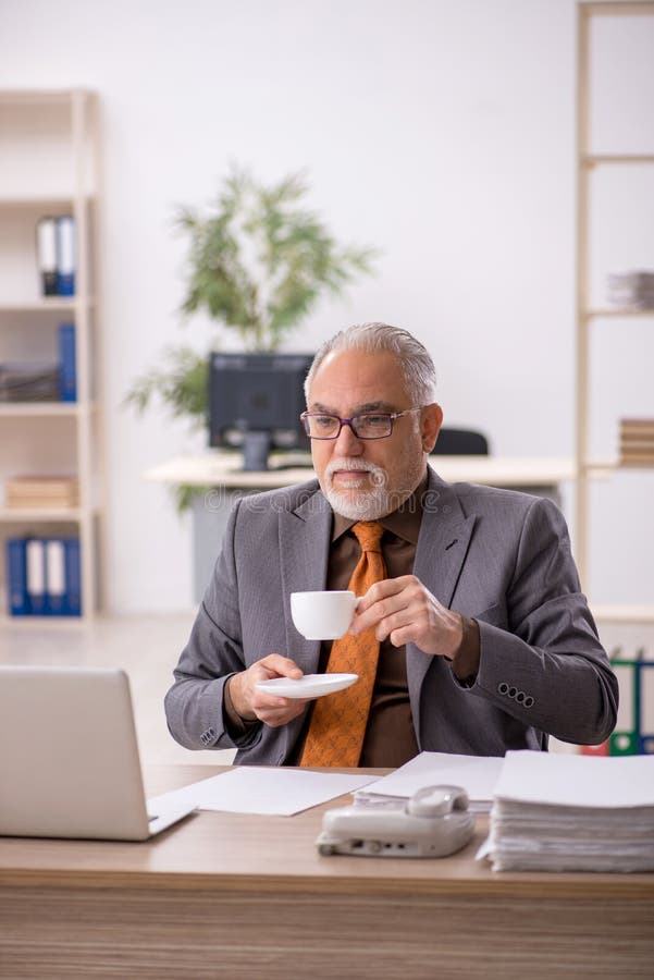 Old Male Employee Drinking Coffee during Break Stock Photo - Image of ...