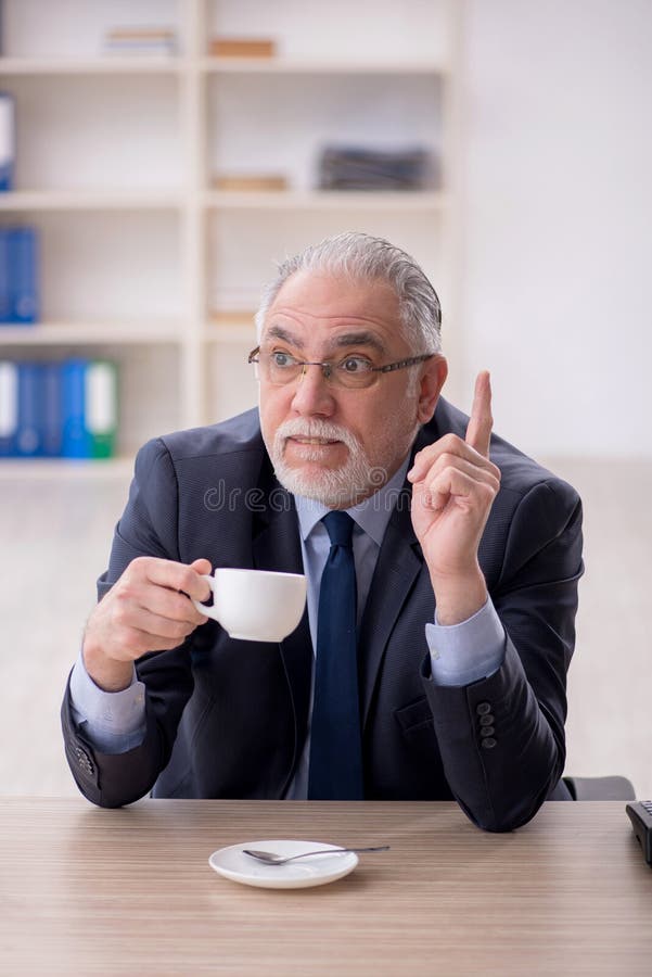 Old Male Employee Drinking Tea in the Office Stock Image - Image of ...