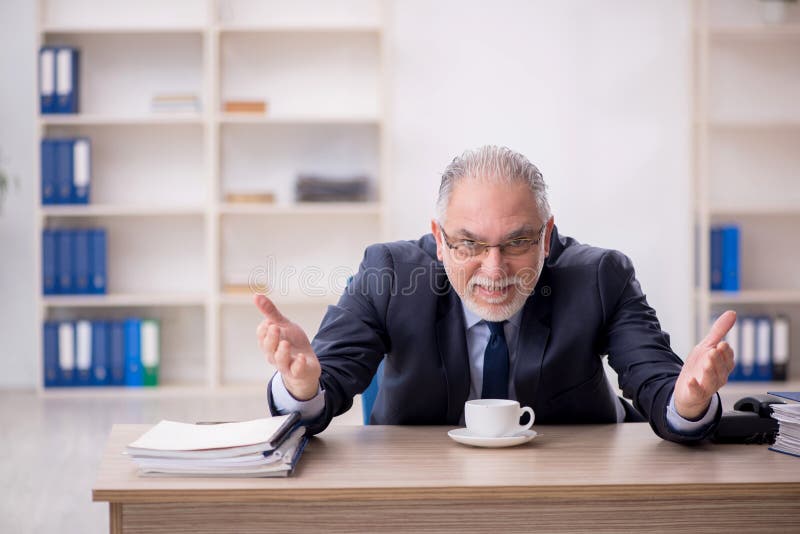 Old Male Employee Drinking Tea in the Office Stock Photo - Image of ...