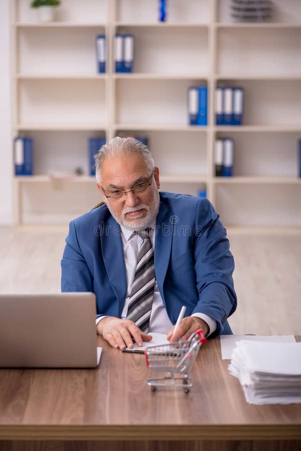 Old Male Employee in E-commerce Concept Stock Photo - Image of buying ...