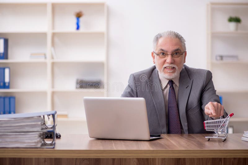 Old Male Employee in E-commerce Concept Stock Image - Image of working ...
