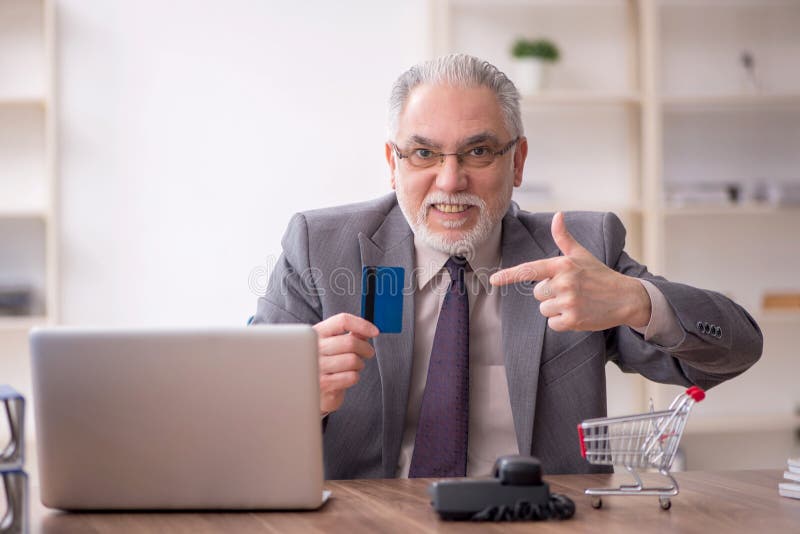 Old Male Employee in E-commerce Concept Stock Image - Image of manager ...