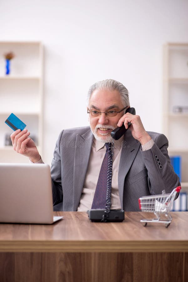 Old Male Employee in E-commerce Concept Stock Image - Image of checkout ...