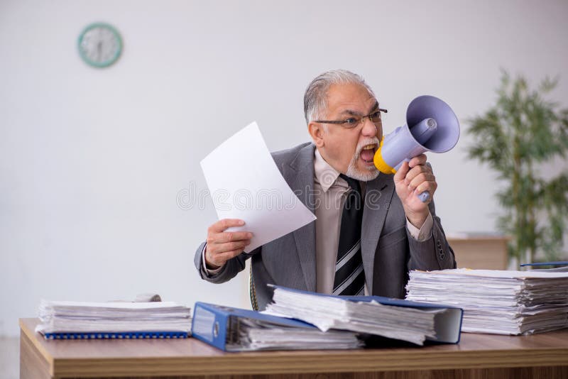 Old Male Employee Holding Megaphone in the Office Stock Photo - Image ...