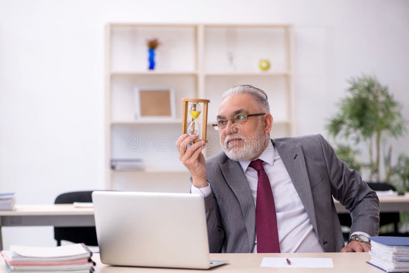 Old Male Employee in Time Management Concept Stock Photo - Image of ...