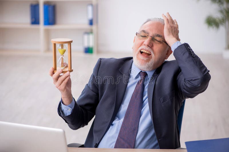 Old Male Employee in Time Management Concept Stock Photo - Image of ...