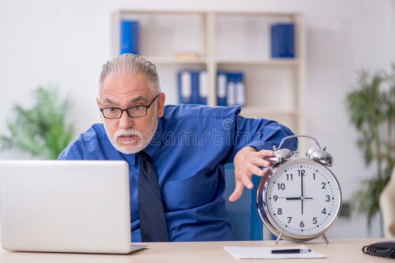 Old Male Employee in Time Management Concept Stock Photo - Image of ...