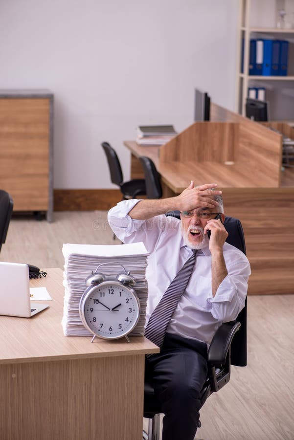 Old Male Employee in Time Manegement Concept Stock Photo - Image of ...