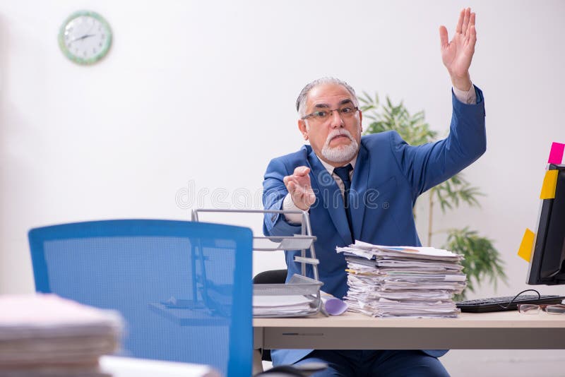 Old Male Employee and Too Much Work in the Office Stock Image - Image ...