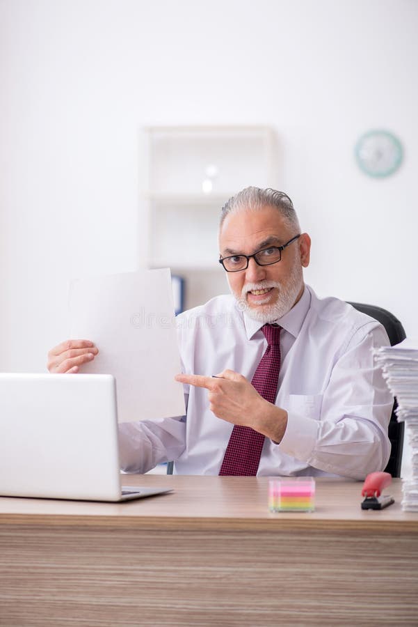 Old Male Employee and Too Much Work in the Office Stock Photo - Image ...