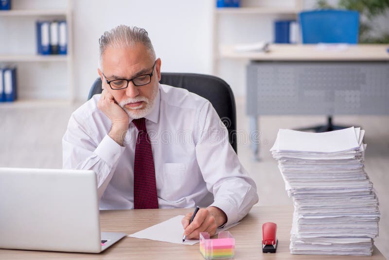 Old Male Employee and Too Much Work in the Office Stock Image - Image ...