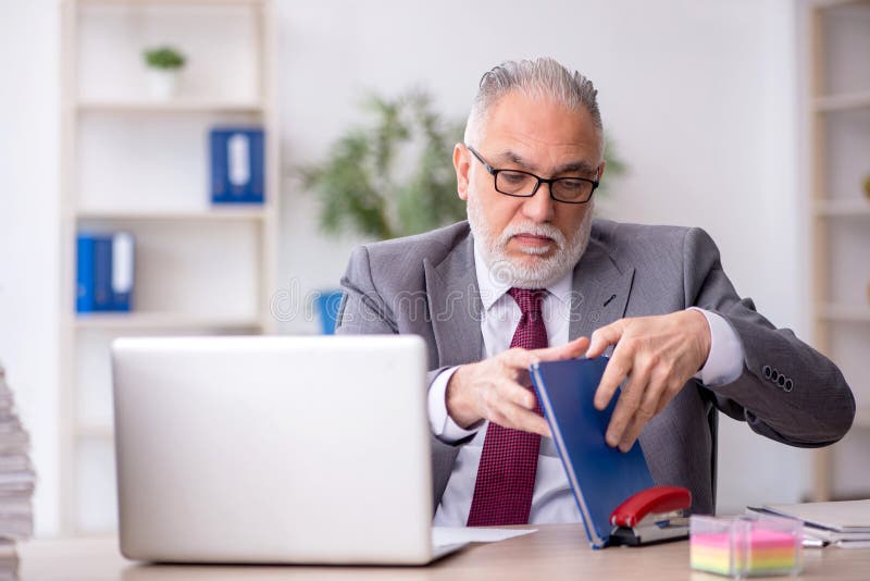 Old Male Employee and Too Much Work in the Office Stock Image - Image ...