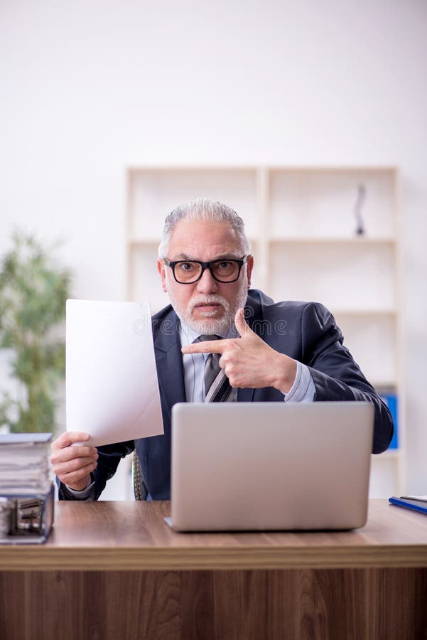 Old Male Employee and Too Much Work at Workplace Stock Image - Image of ...