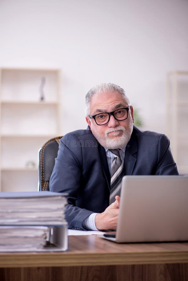 Old Male Employee and Too Much Work at Workplace Stock Image - Image of ...