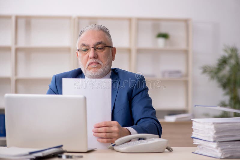 Old Male Employee and Too Much Work at Workplace Stock Image - Image of ...