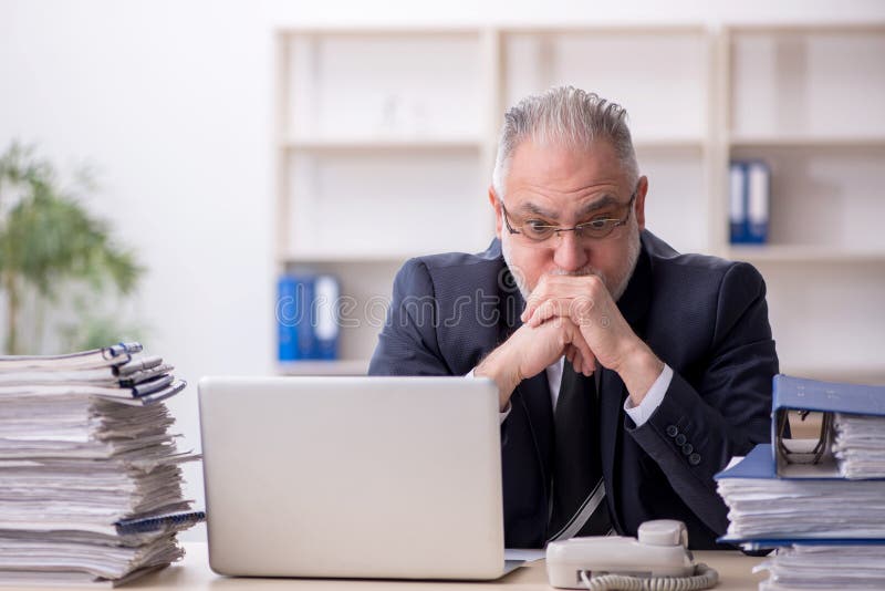 Old Male Employee and Too Much Work at Workplace Stock Image - Image of ...