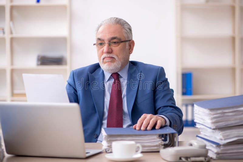 Old Male Employee and Too Much Work at Workplace Stock Image - Image of ...