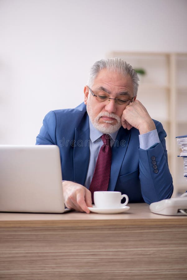 Old Male Employee and Too Much Work at Workplace Stock Image - Image of ...