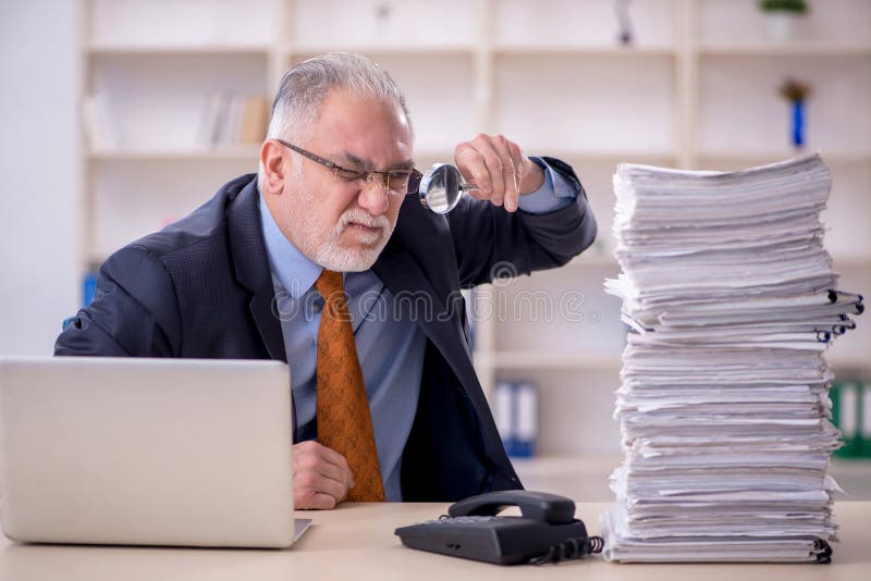 Old Male Employee Unhappy with Excessive Work in the Office Stock Photo ...