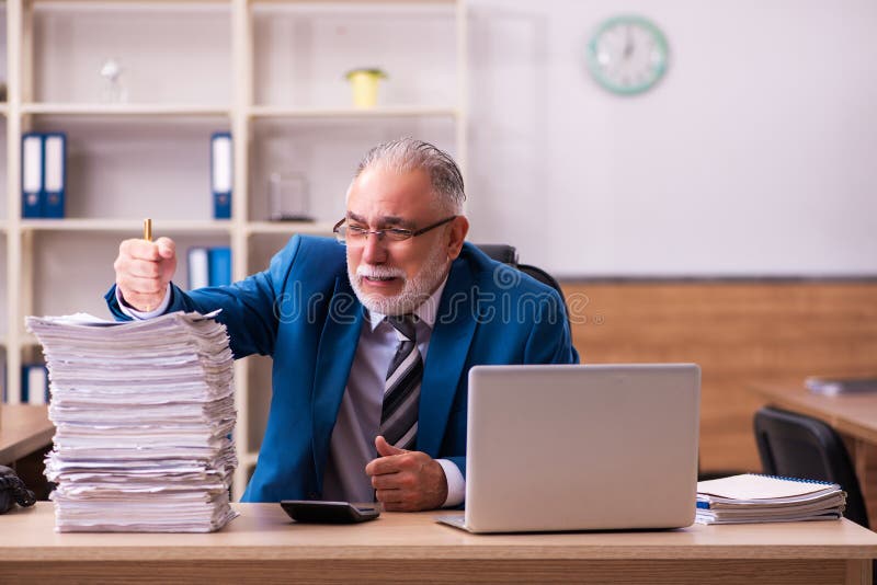 Old Male Employee Unhappy with Excessive Work in the Office Stock Photo ...