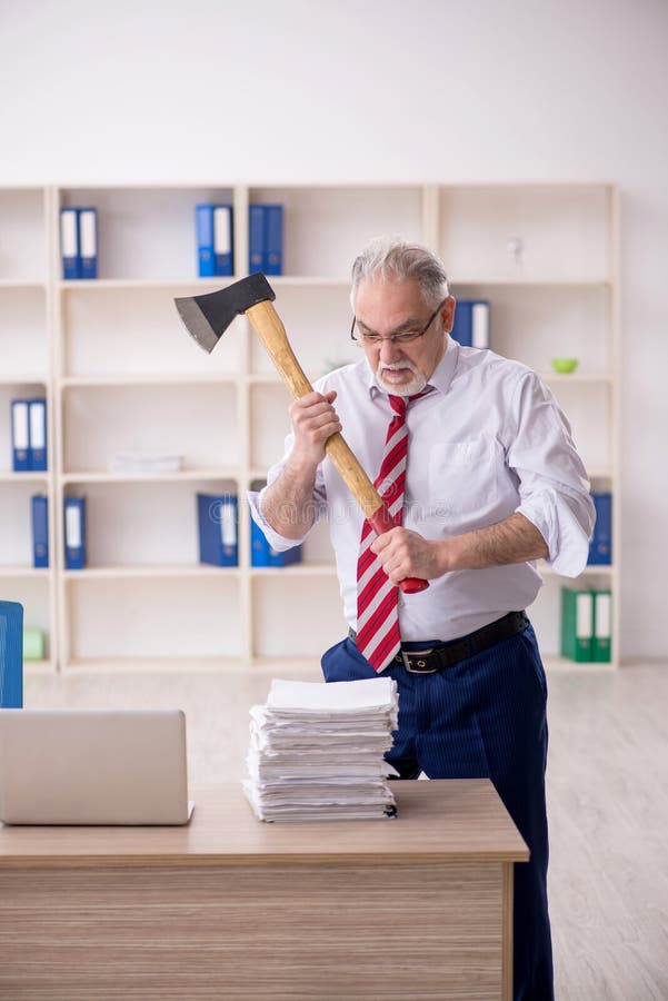 Old Male Employee Unhappy with Excessive Work in the Office Stock Photo ...