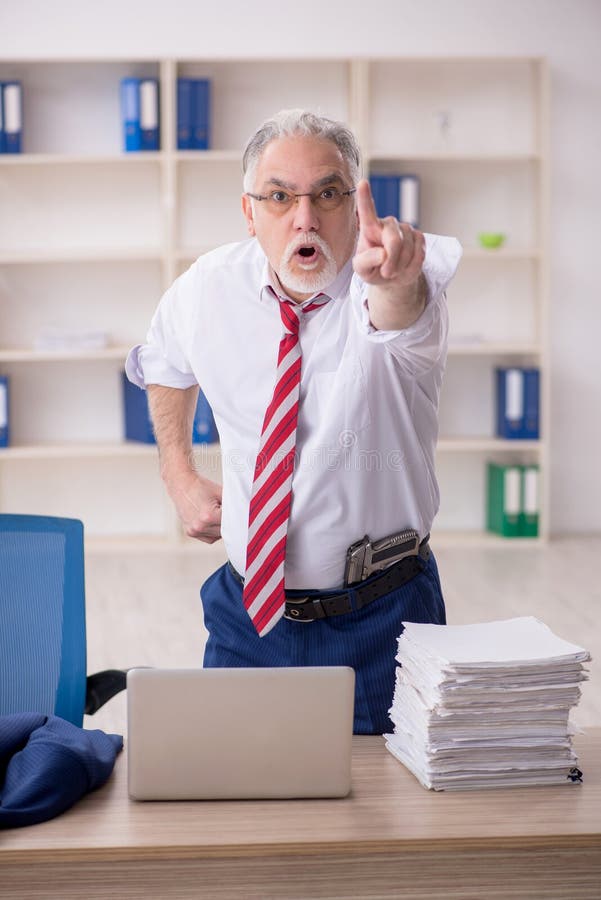Old Male Employee Unhappy with Excessive Work in the Office Stock Image ...