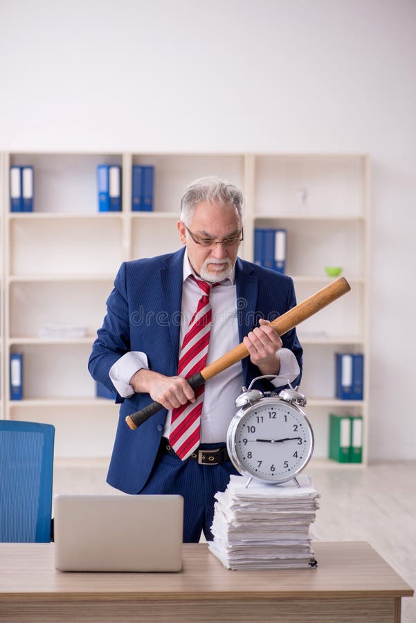 Old Male Employee Unhappy with Excessive Work in the Office Stock Image ...