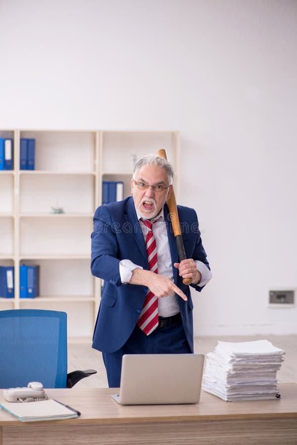 Old Male Employee Unhappy with Excessive Work in the Office Stock Image ...