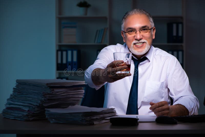 Old Male Employee Working Late in the Office Stock Photo - Image of ...