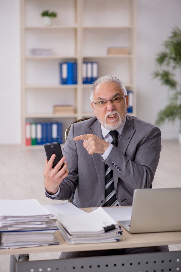 Old Male Employee Working in the Office Stock Image - Image of showing ...