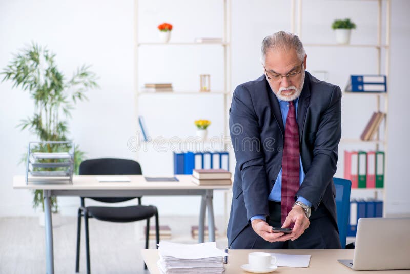 Old Male Employee Working in the Office Stock Photo - Image of ...