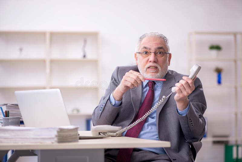 Old Male Employee Working in the Office Stock Photo - Image of ...