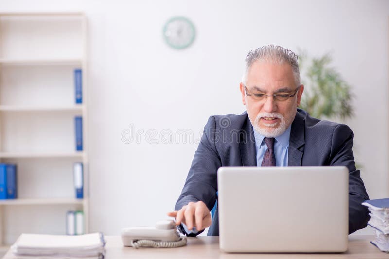 Old Male Employee Working in the Office Stock Image - Image of employee ...