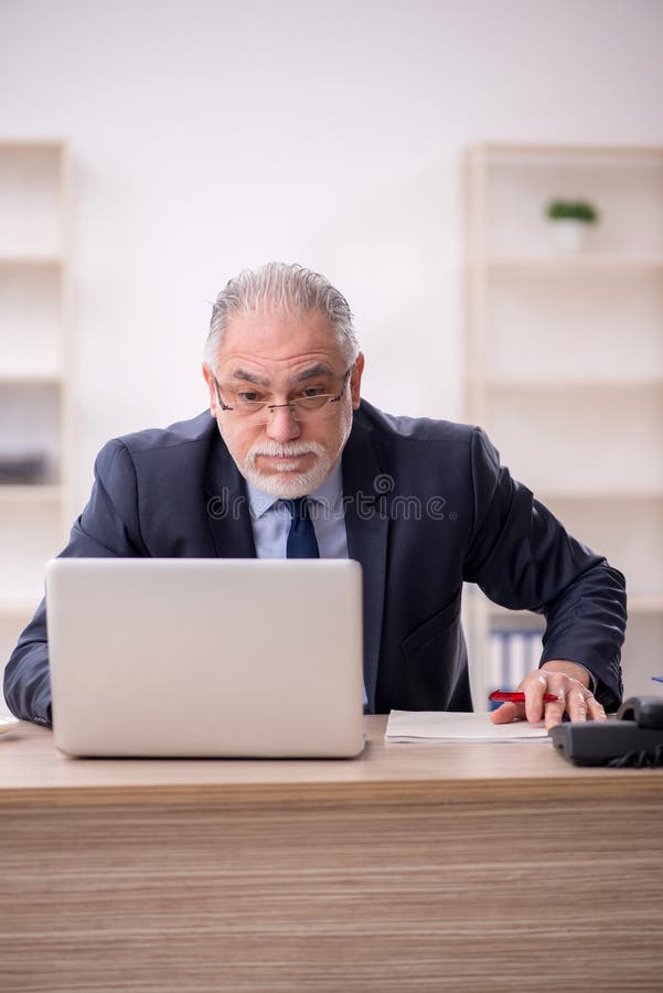 Old Male Employee Working in the Office Stock Image - Image of employee ...