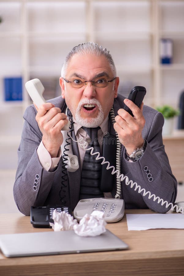 Old Male Employee Working at Workplace Stock Photo - Image of ...