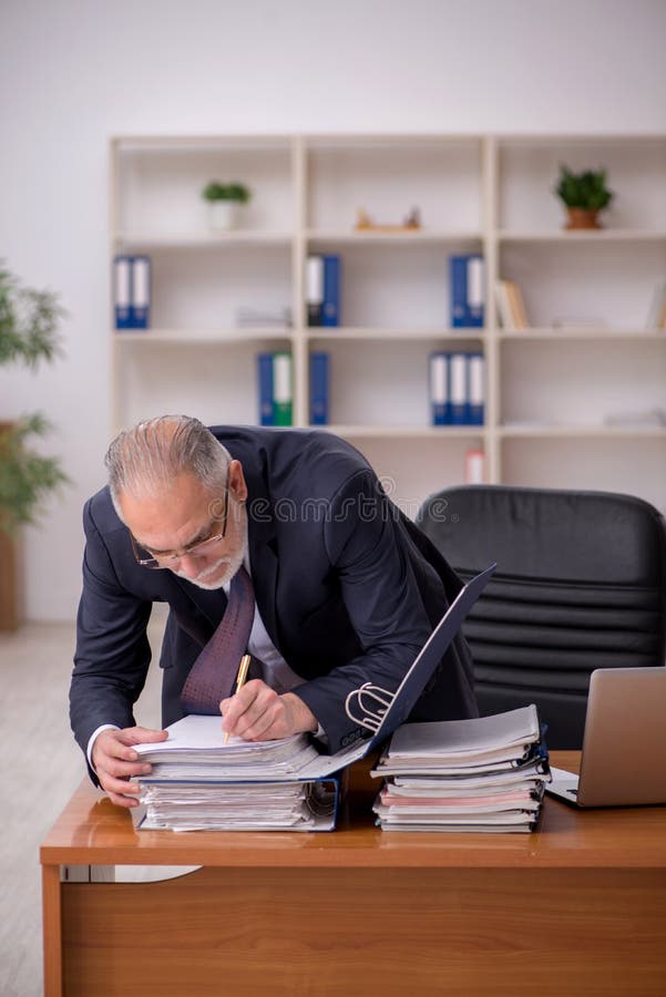 Old Male Employer and Too Much Work in the Office Stock Photo - Image ...