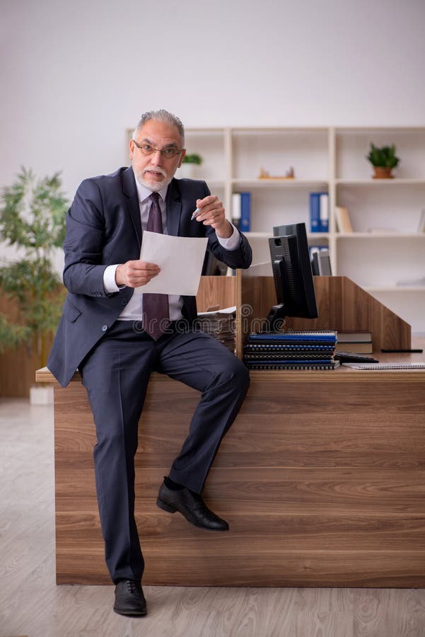 Old Male Employer and Too Much Work in the Office Stock Photo - Image ...