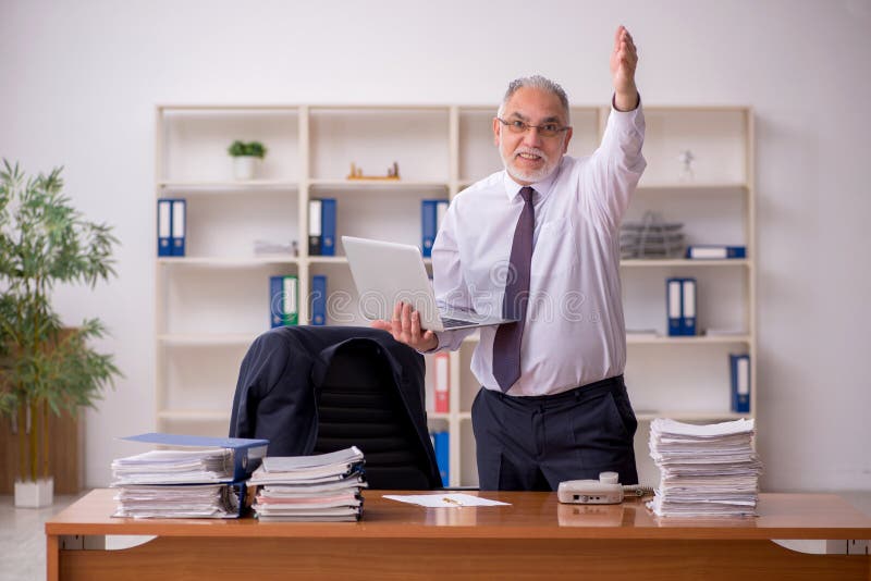 Old Male Employer and Too Much Work in the Office Stock Photo - Image ...