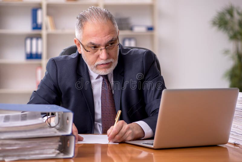 Old Male Employer and Too Much Work in the Office Stock Image - Image ...