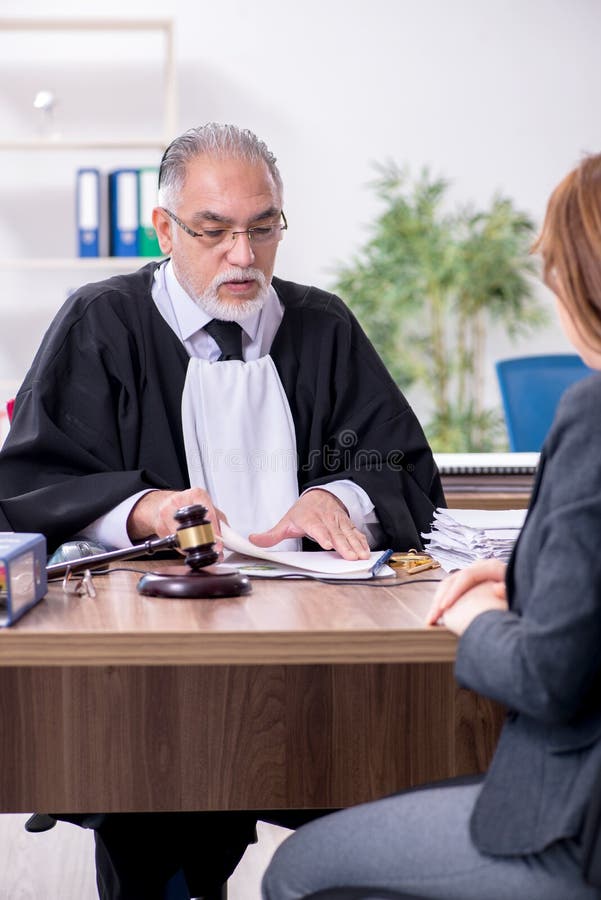 Old Male Judge and Female Client in the Office Stock Image - Image of ...