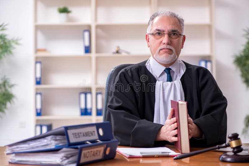 Old Male Judge Working in Courthouse Stock Photo - Image of folders ...