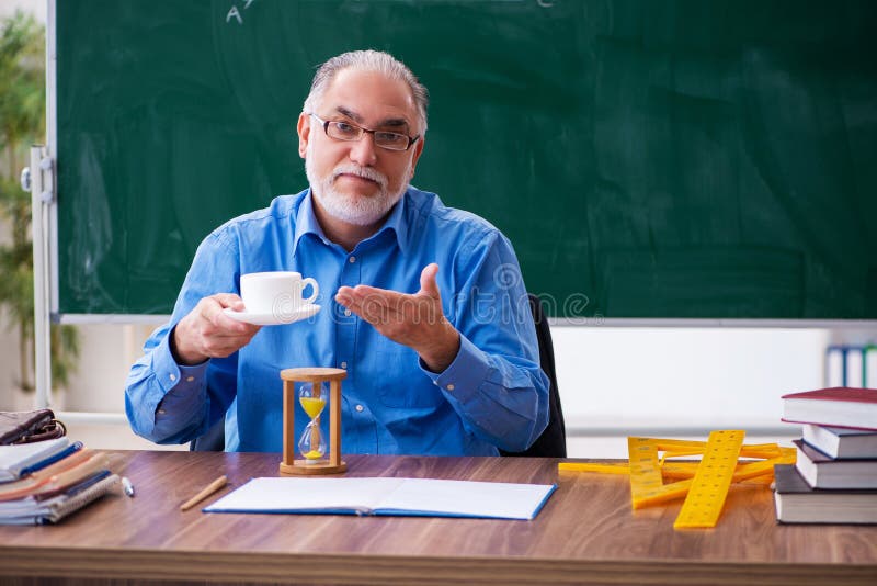 Old Male Math Teacher in Time Management Concept Stock Photo - Image of ...