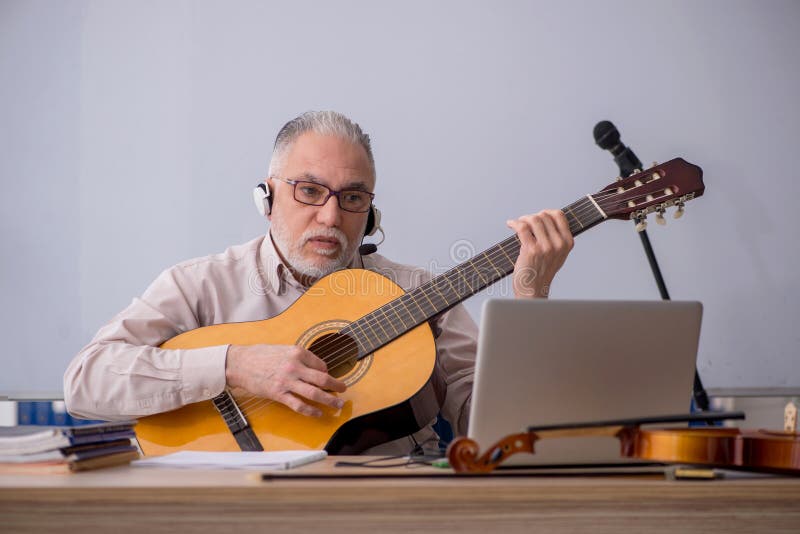 Old Male Music Teacher in the Classroom Stock Image - Image of virtual ...