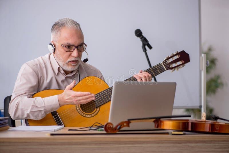 Old Male Music Teacher in the Classroom Stock Photo - Image of board ...